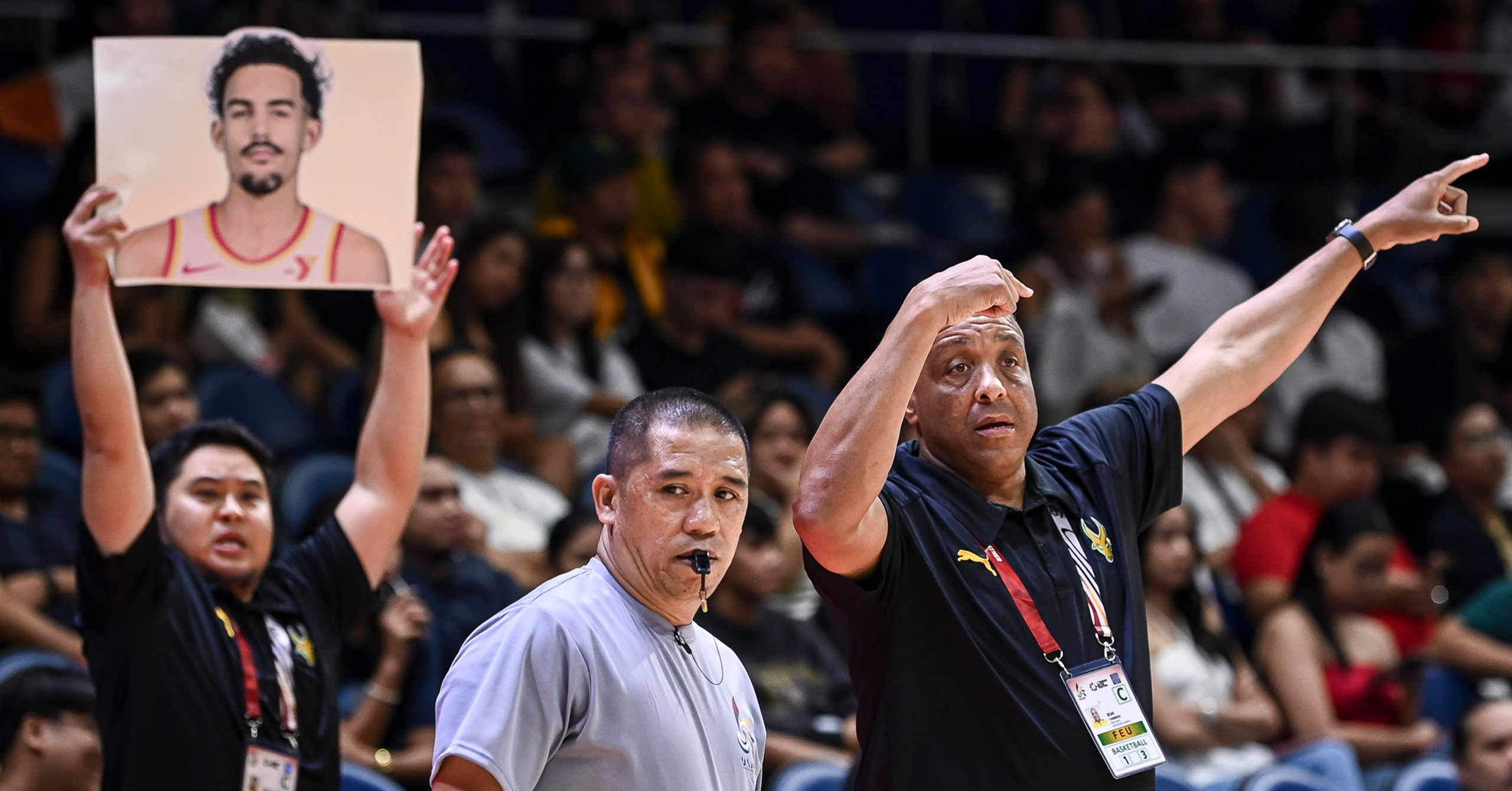 Here's Why Sean Chambers Uses Placards To Call FEU's Plays