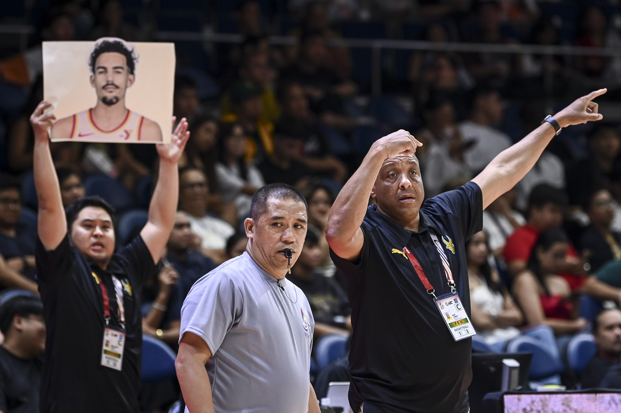 Here's Why Sean Chambers Uses Placards To Call FEU's Plays