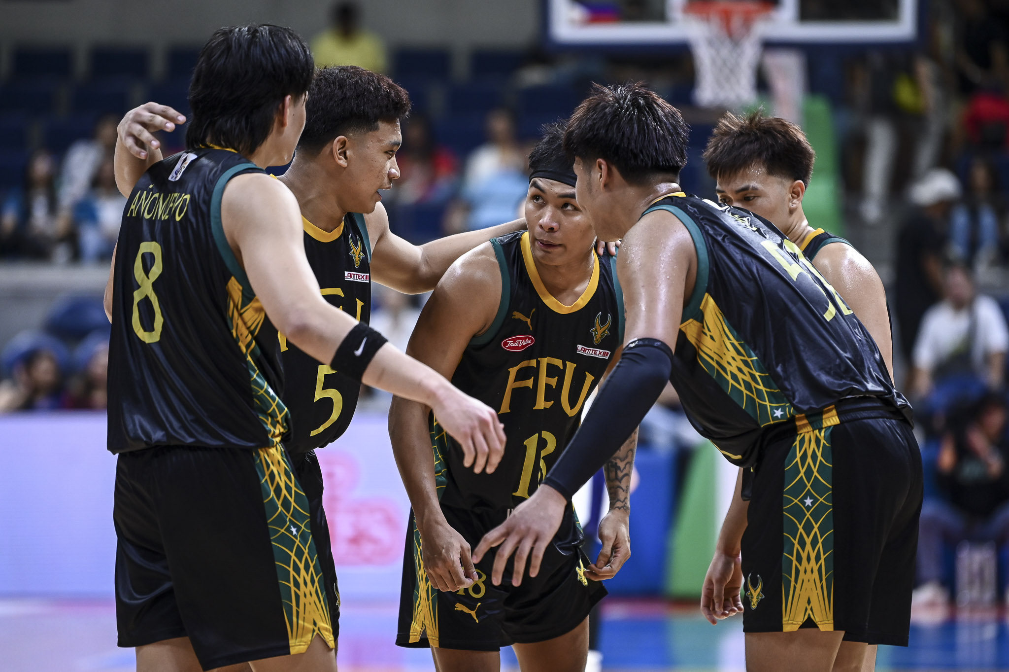 Here's Why Sean Chambers Uses Placards To Call FEU's Plays